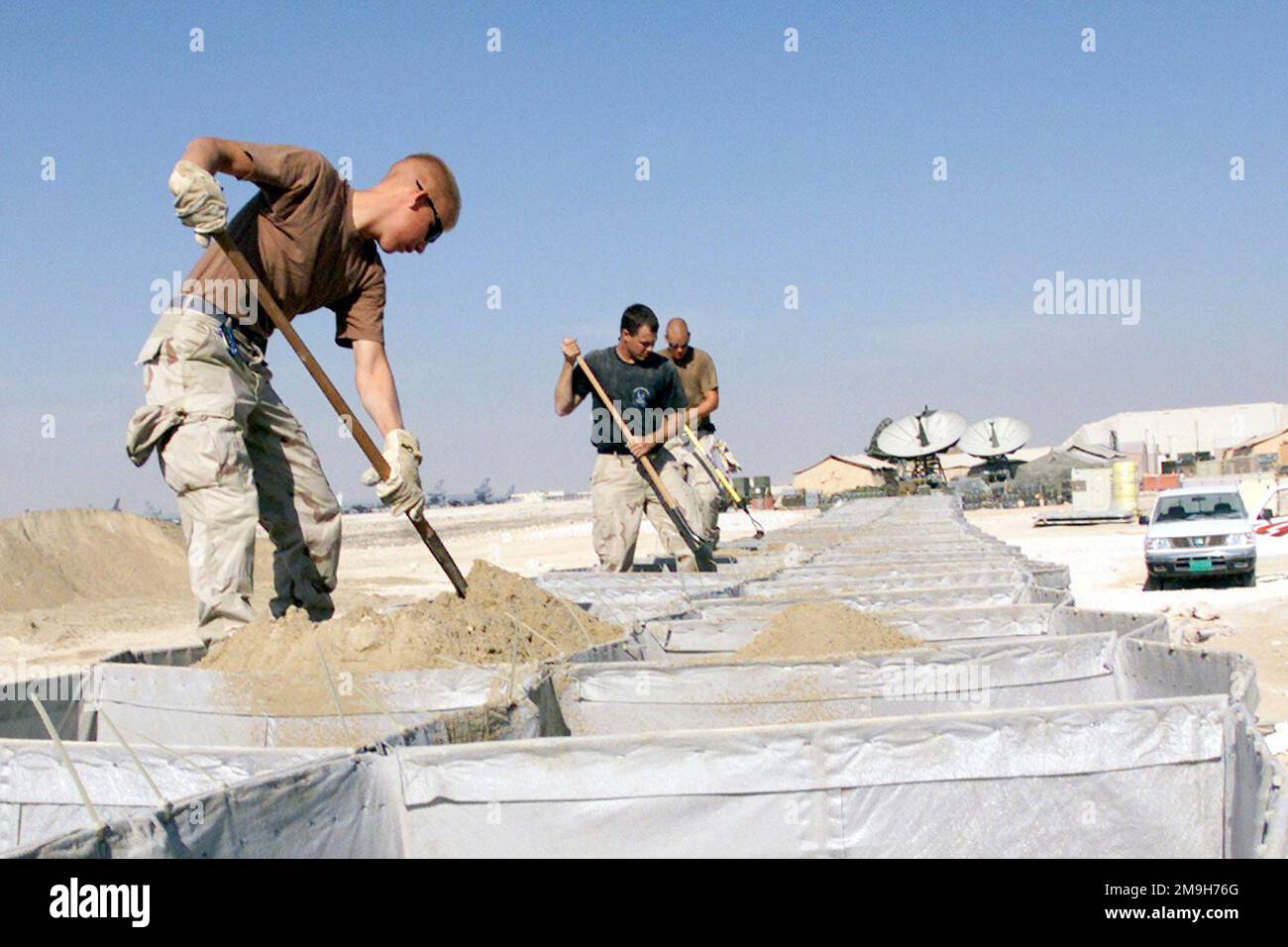 AIRMAN First Class (A1C) Derek Geske (left), SENIOR AIRMAN (SRA) Randy ...