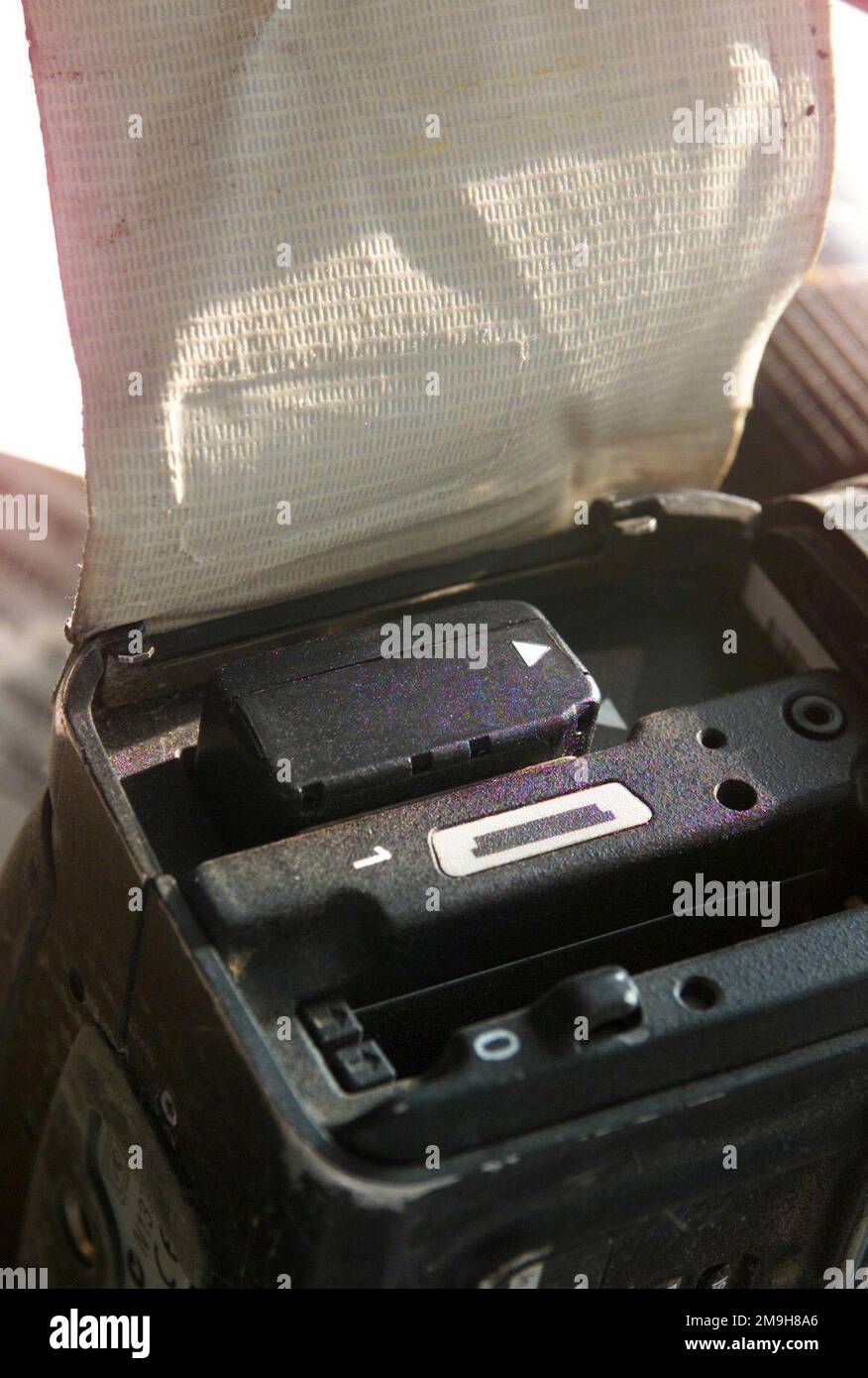 A close up photograph of a Kodak DCS620 w/Nikon F5 camera body operated ...