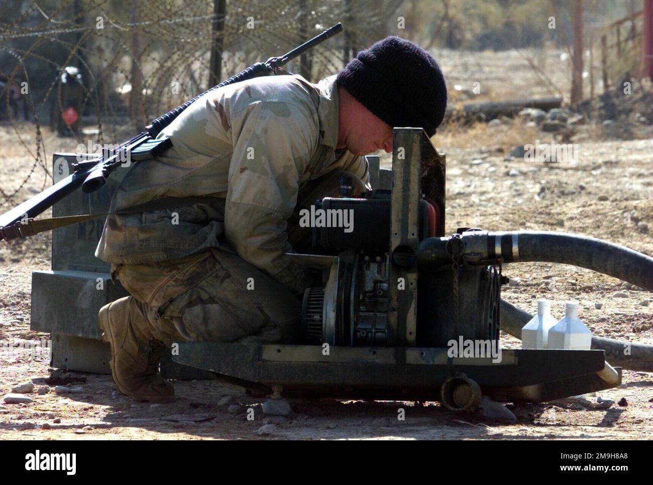 With his M-16 across his back, Lance Corporal Player, USMC, Marine ...