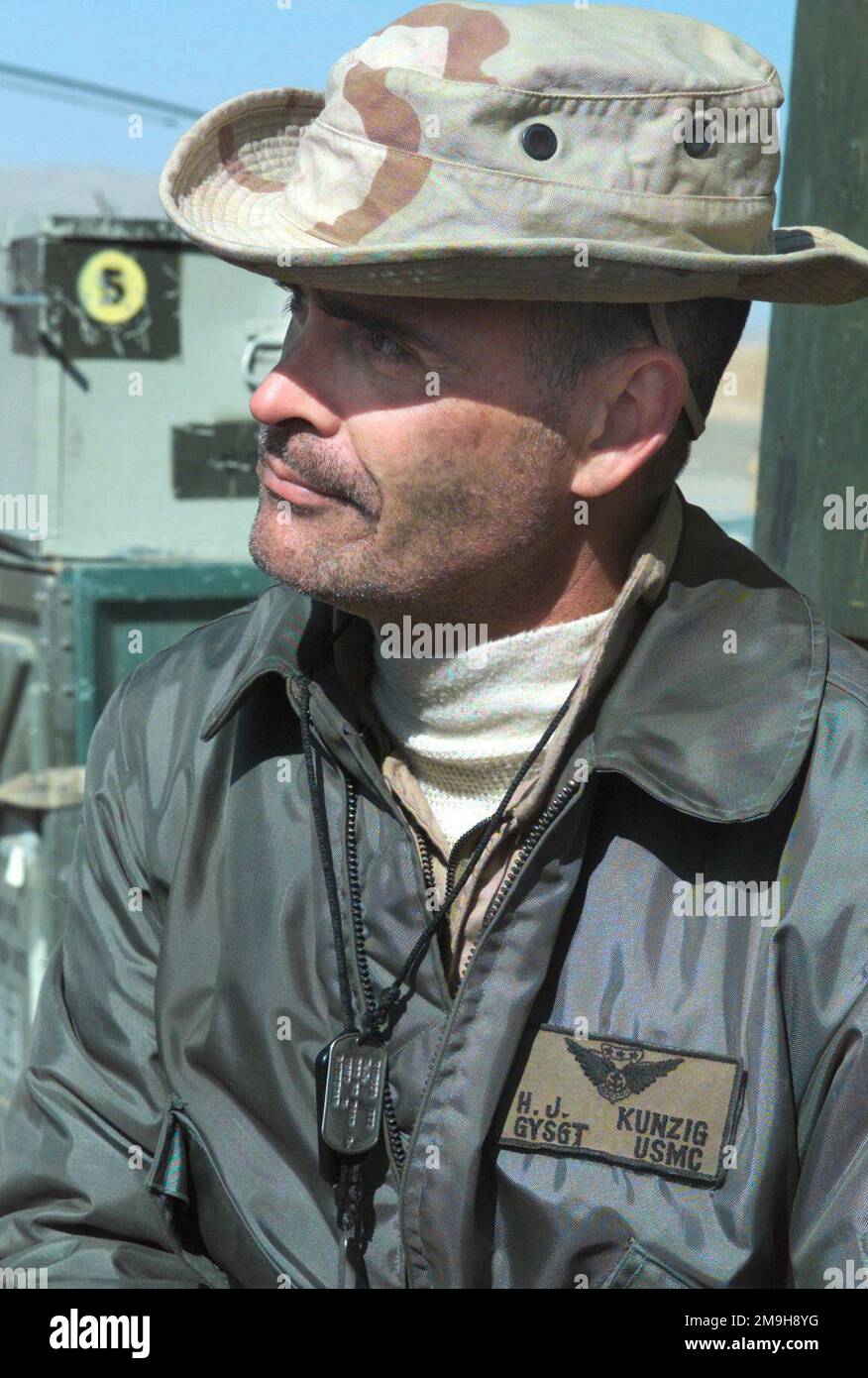 GUNNERY Sergeant H.J. Kunzig, USMC, an aerial observer for Helicopter ...