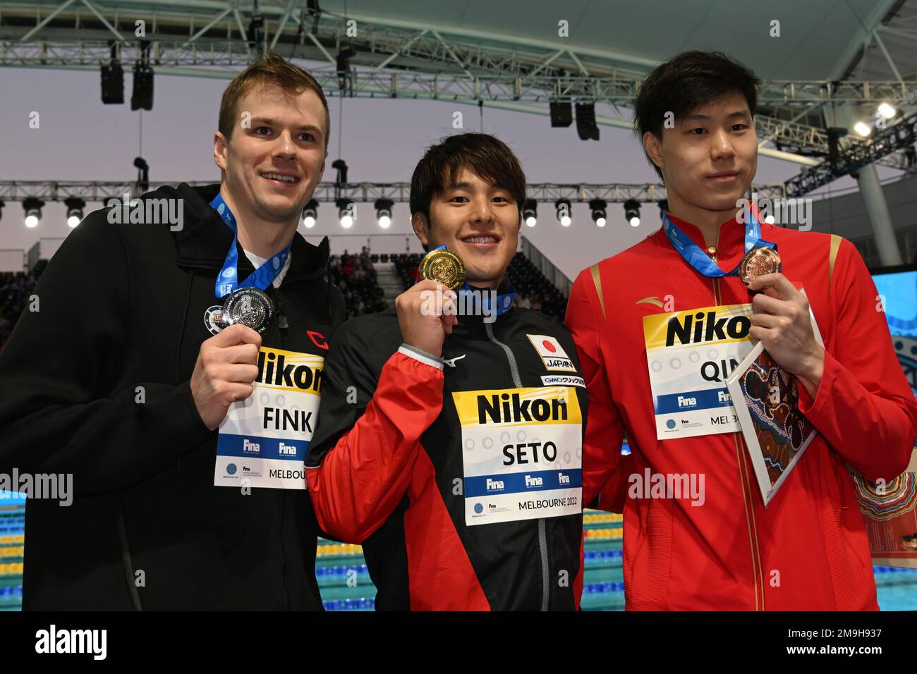 Daiya Seto of Japan, center, Nic Fink of the U.S., left and Qin Haiyang ...