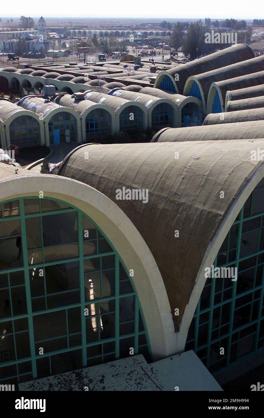 A view of the mosque, upper left, at the Kandahar International Airport ...