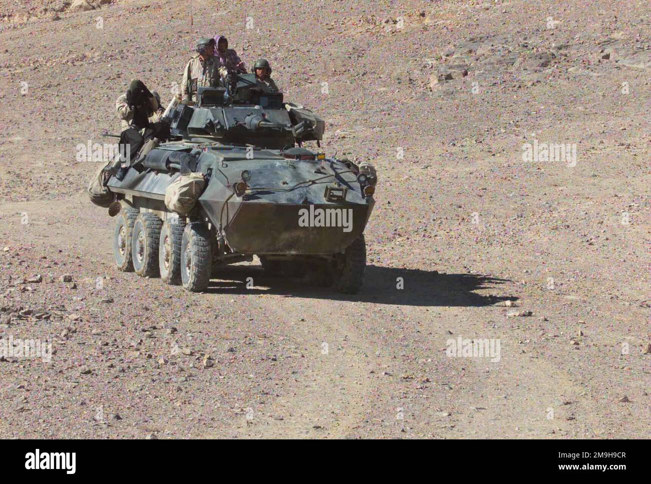 With an Afghan interpreter onboard their Light Armored Vehicle (LAV-25 ...