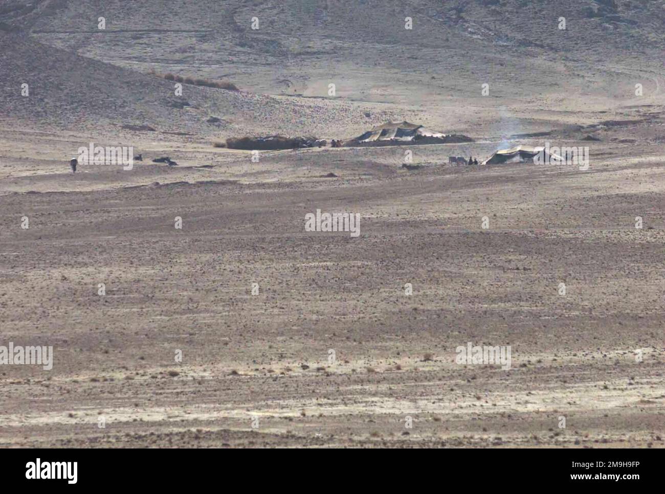 A view of an Afghan tent compound near the Kandahar International ...