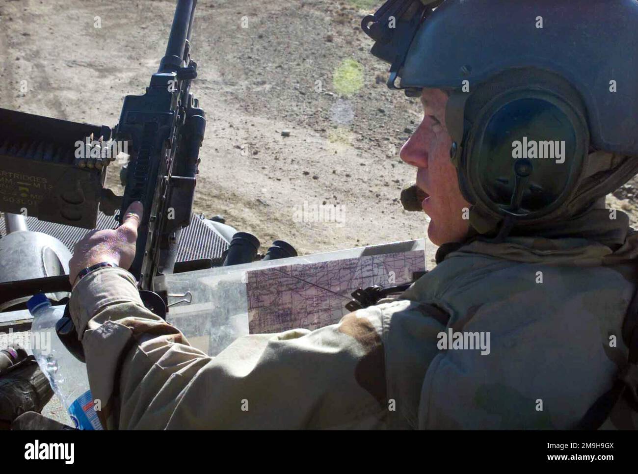 First Lieutenant Lennon, USMC, provides guidance to his Marines while ...