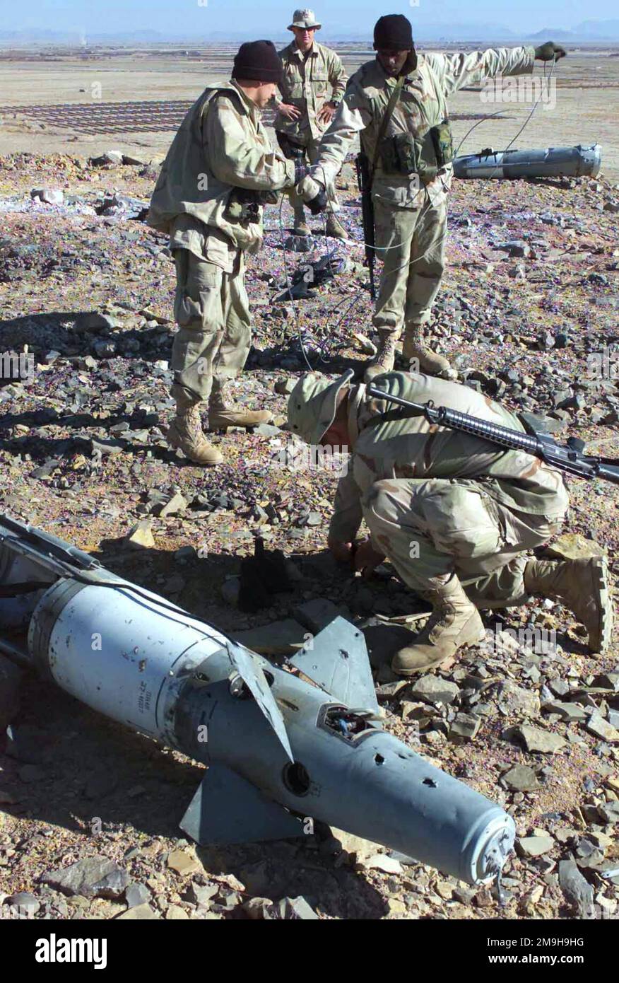 STAFF Sergeant William A. Scott (foreground), USMC, with the Explosive ...