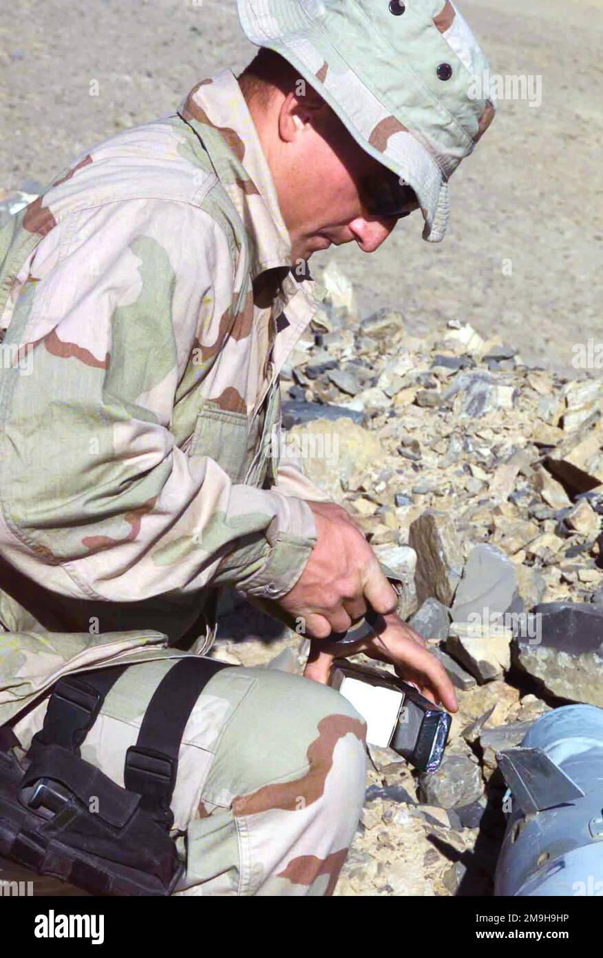 Sergeant Gattis, USMC, with the Explosive Ordnance Disposal section ...