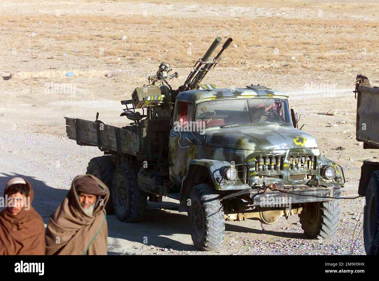 A technical vehicle, a Zil-131 cargo truck with a ZU-23-2 anti-aircraft ...