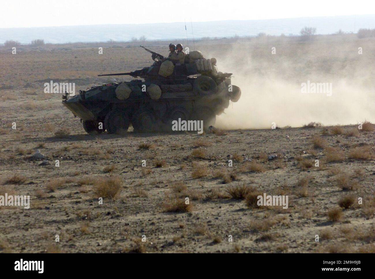 Kicking up a bit of a dust cloud, Marines with Alpha Company, Second ...