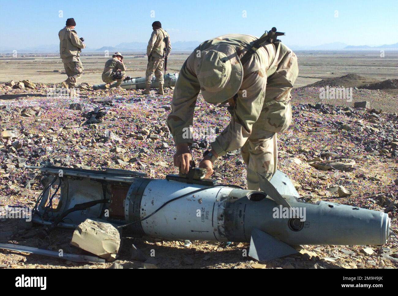 STAFF Sergeant William A. Scott (foreground), USMC, with the Explosive ...