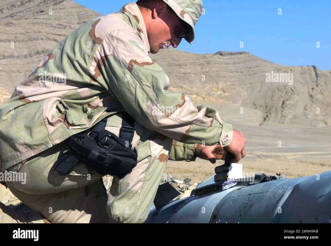 Sergeant Gattis, USMC, with the Explosive Ordnance Disposal section ...