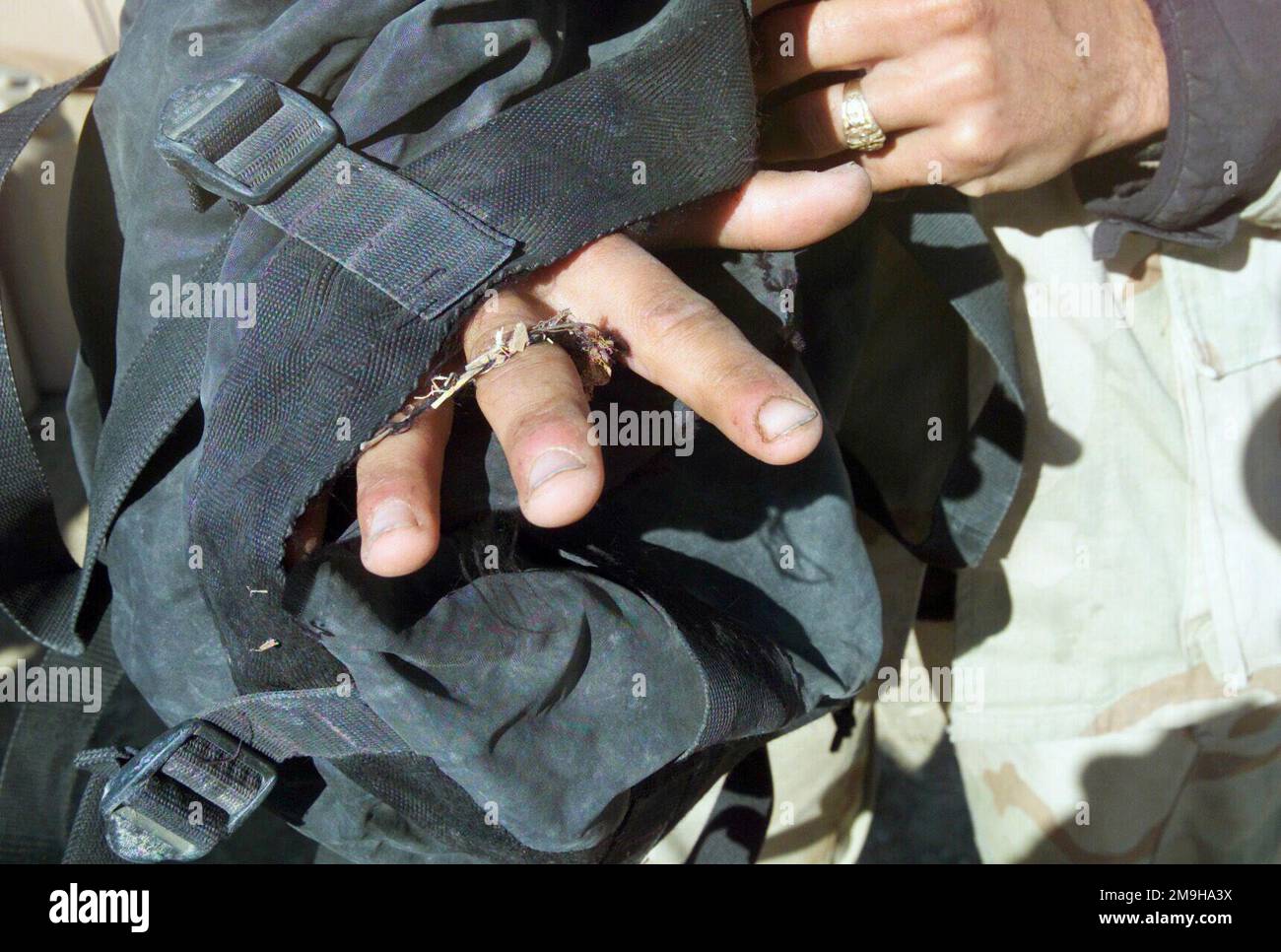 A view of a damaged sleeping bag stuff sack used by a Marine with Kilo ...