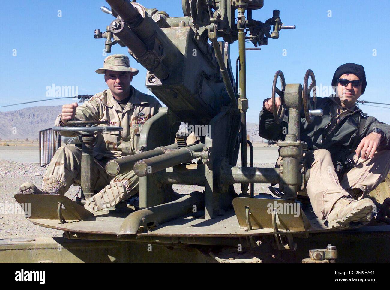 Major Mark Schrecker (left), USMC, a pilot with the Marine Central ...