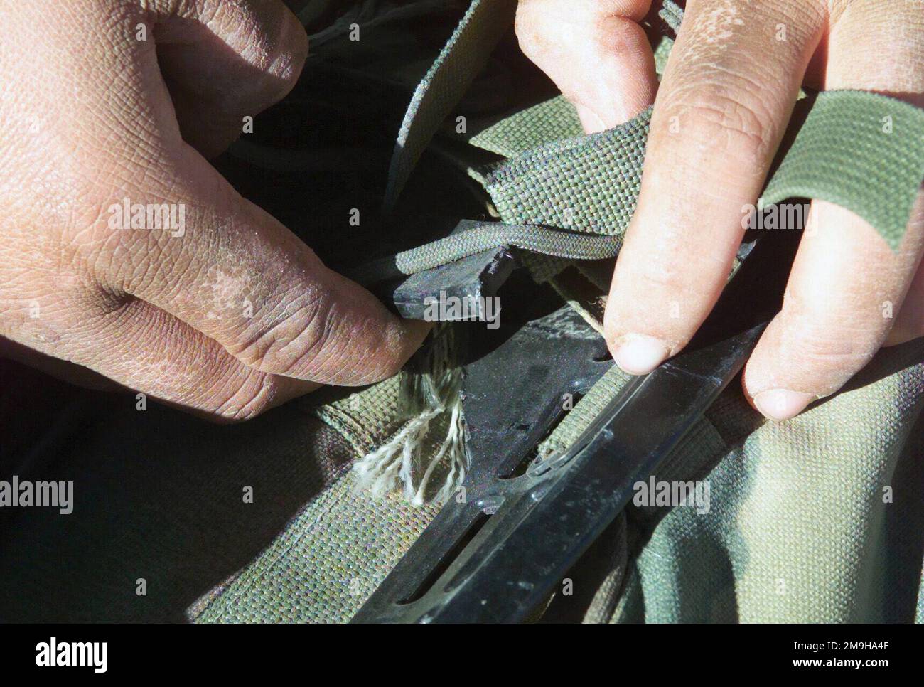 A view of damage to MOLLE (MOdular Lightweight Load-carrying Equipment ...