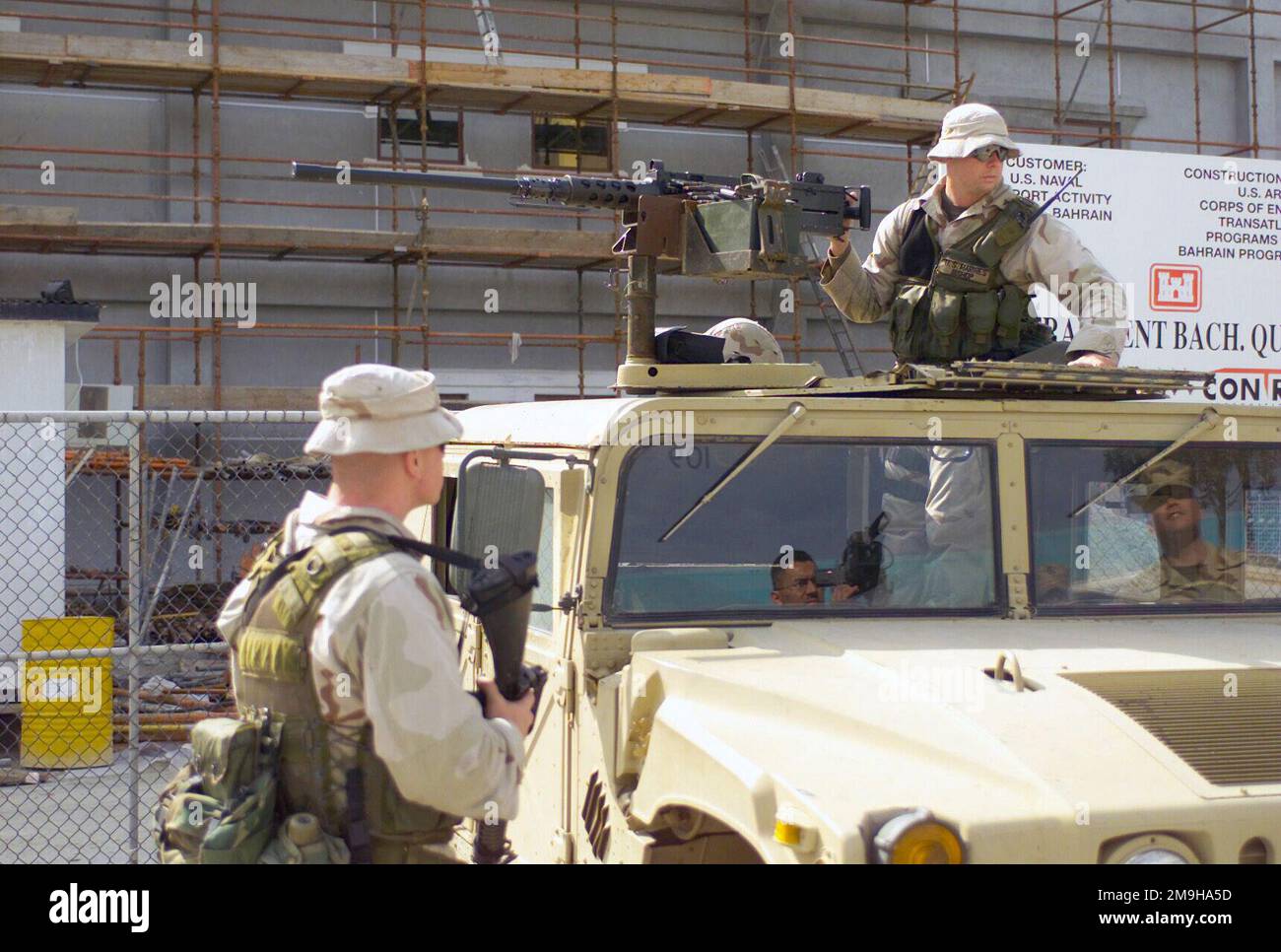 Lance Corporal (LCPL) Andrew D. Bishop, USMC, mans the M2HB .50-Quick ...