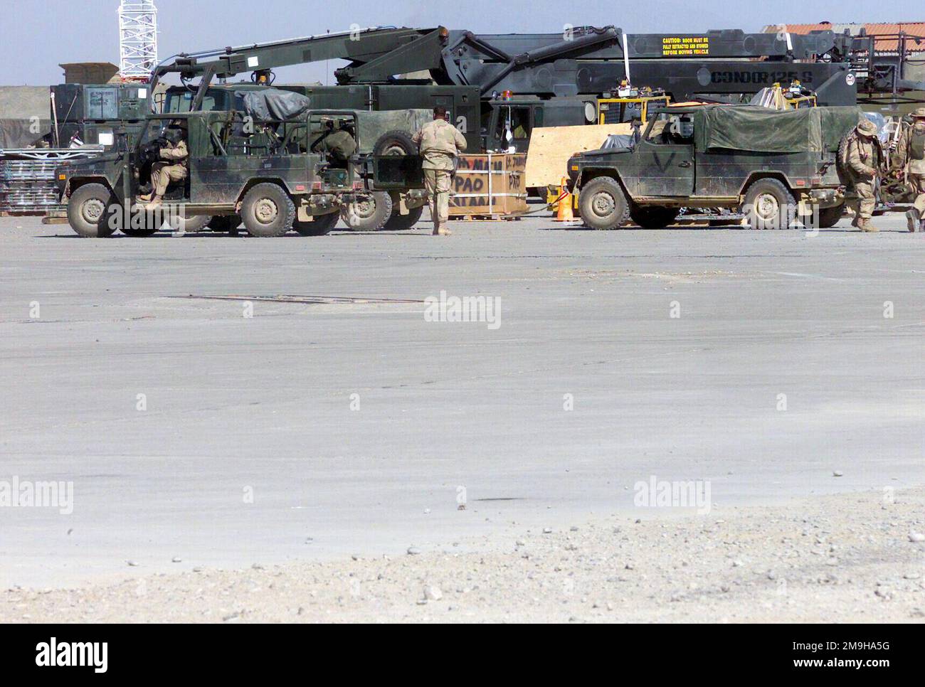 A Mercedes G Interim Fast Attack Vehicle (IFAV) being towed by another ...