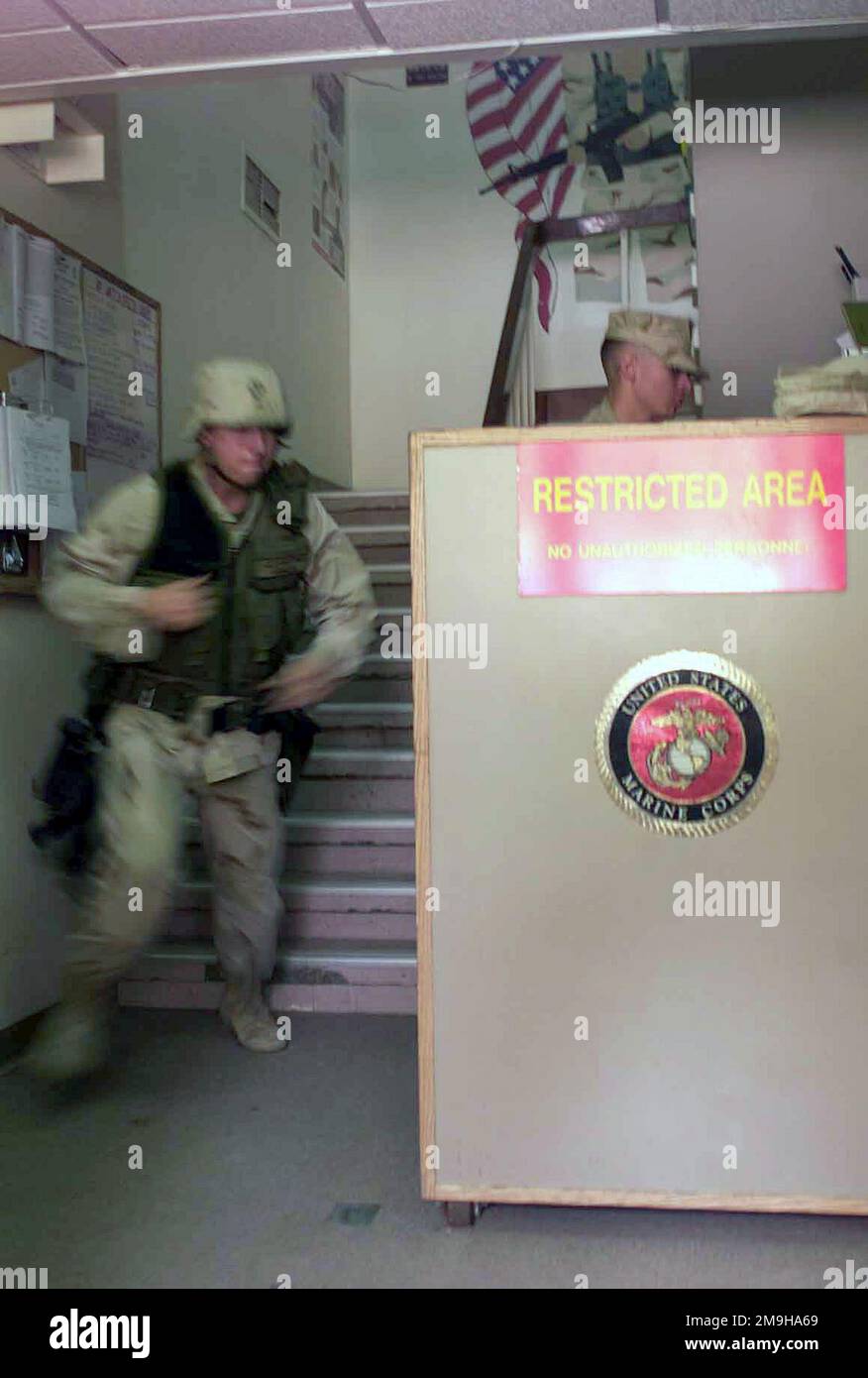 PFC Rahim M. Heath (rear), USMC, stands the React Watch Post as LCpl ...