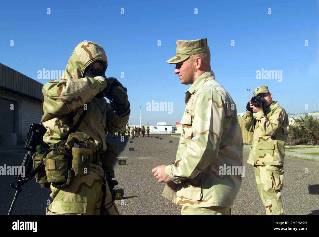 Documenting a spot check by an evaluator, as a Marine goes through the ...