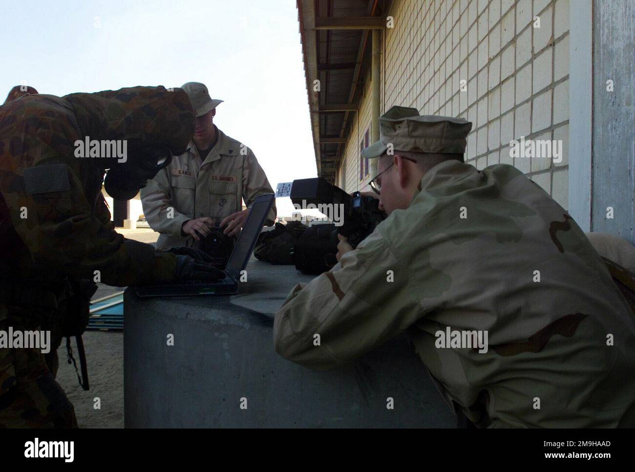 Corporal Bryant V. Cox, USMC, (left) a Combat Photographer with the ...