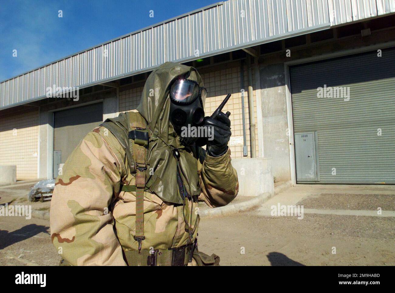 A Marine with the Combined Joint Task Force (CJTF) does a ...