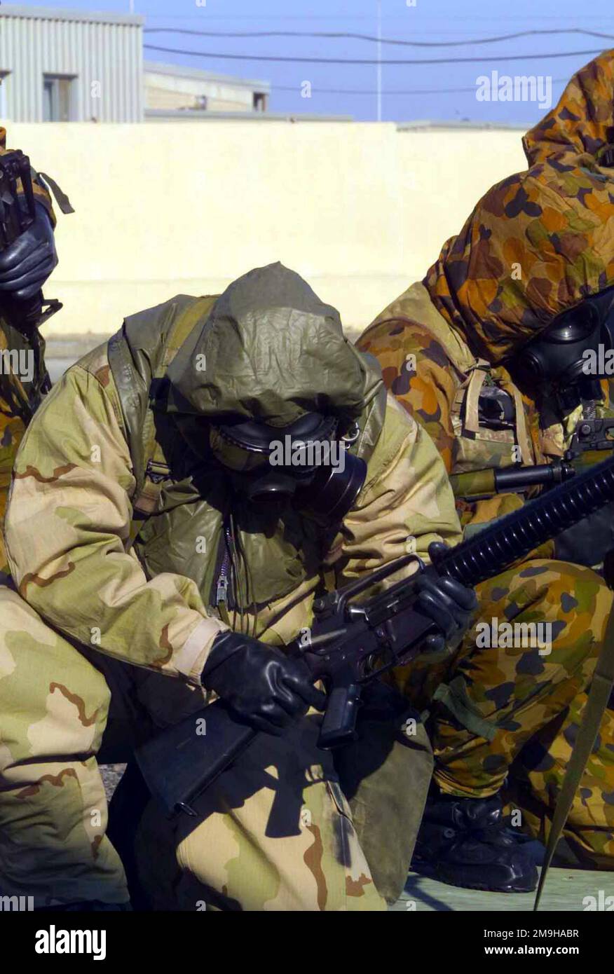 A Marine, from the Combined Joint Task Force, dressed in his Joint ...