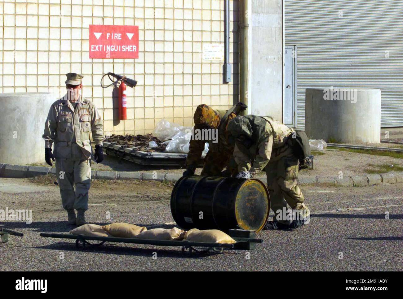 A Marine from the Combined Joint Task Force (CJTF) and an Australian ...