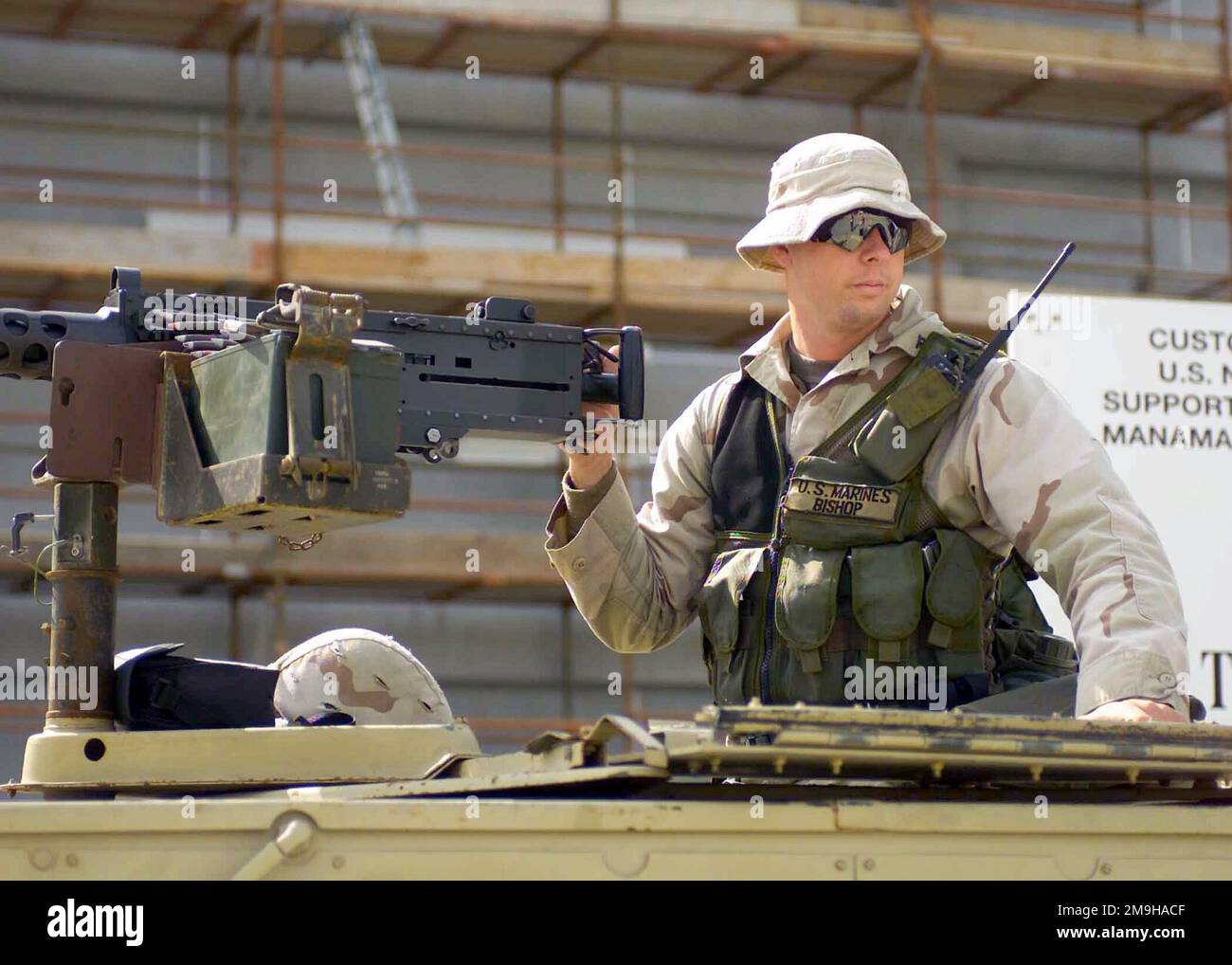 Lance Corporal Andrew D. Bishop, USMC, mans the M2HB .50-Quick Change ...