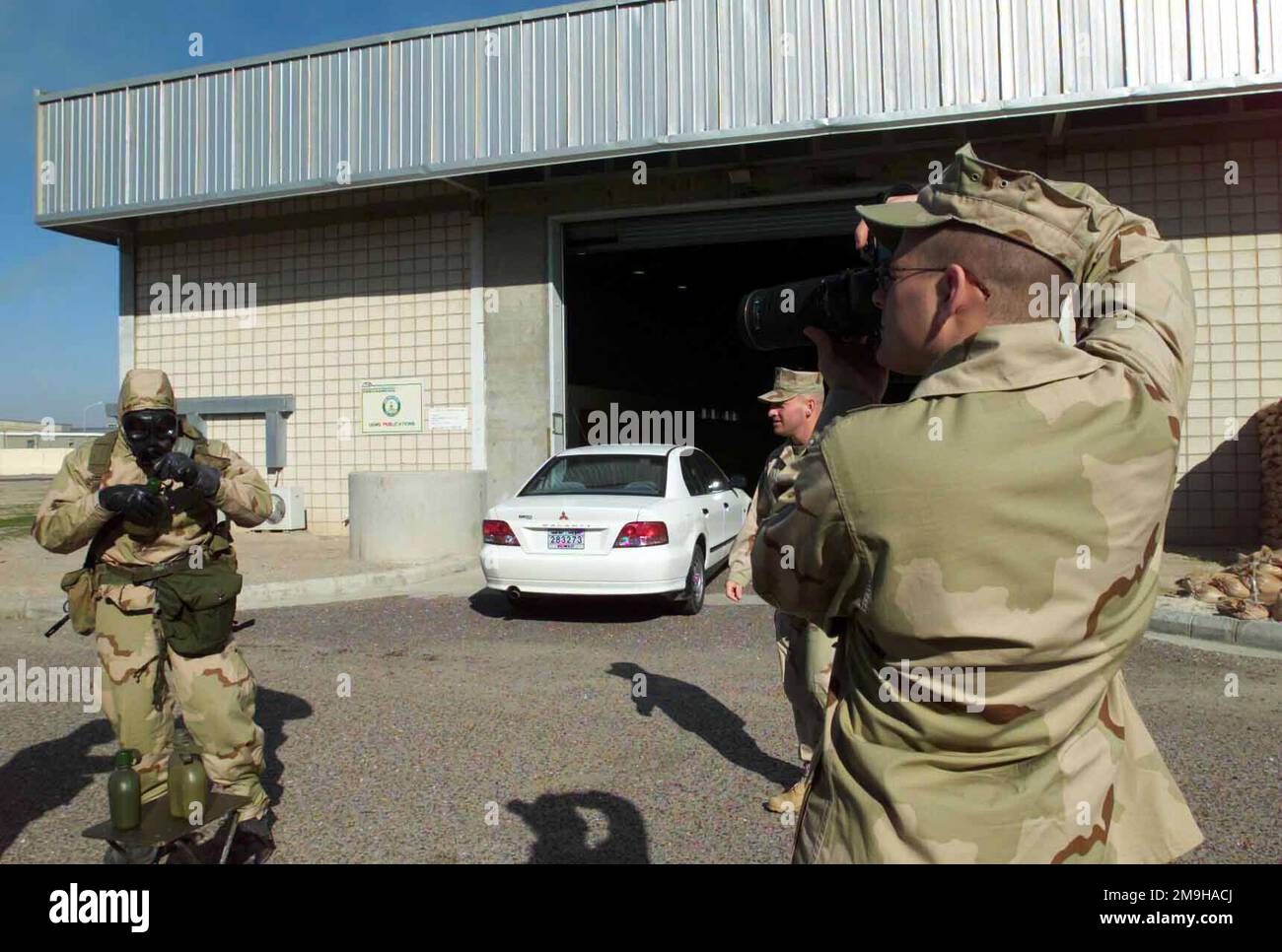Corporal Bryant V. Cox (right) a Combat Photographer with the Marcent ...