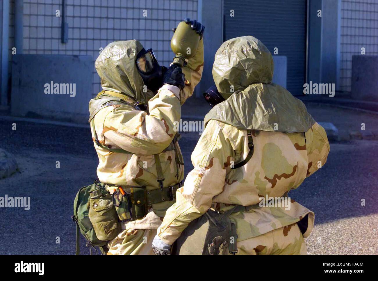 Marines with Combined Joint Task Force (CJTF) assists each other while ...