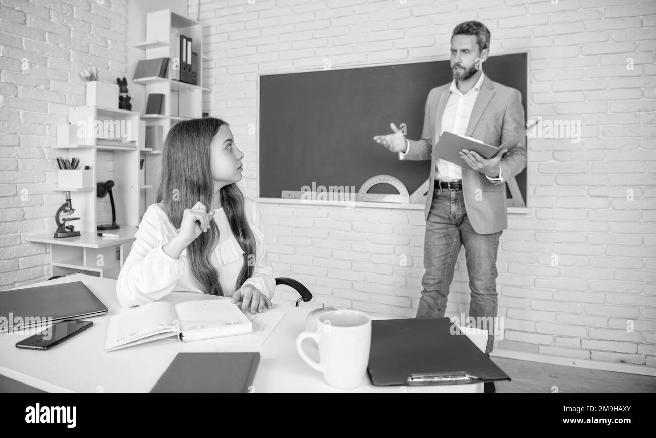 curious child study in classroom with teacher. selective focus Stock ...