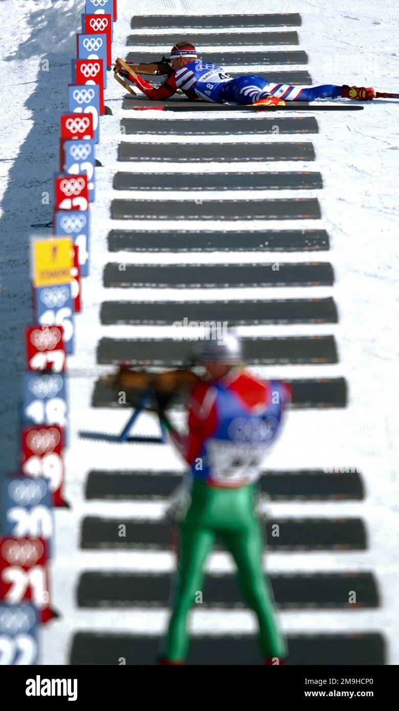 While an opponent takes aim at his target in the standing position ...