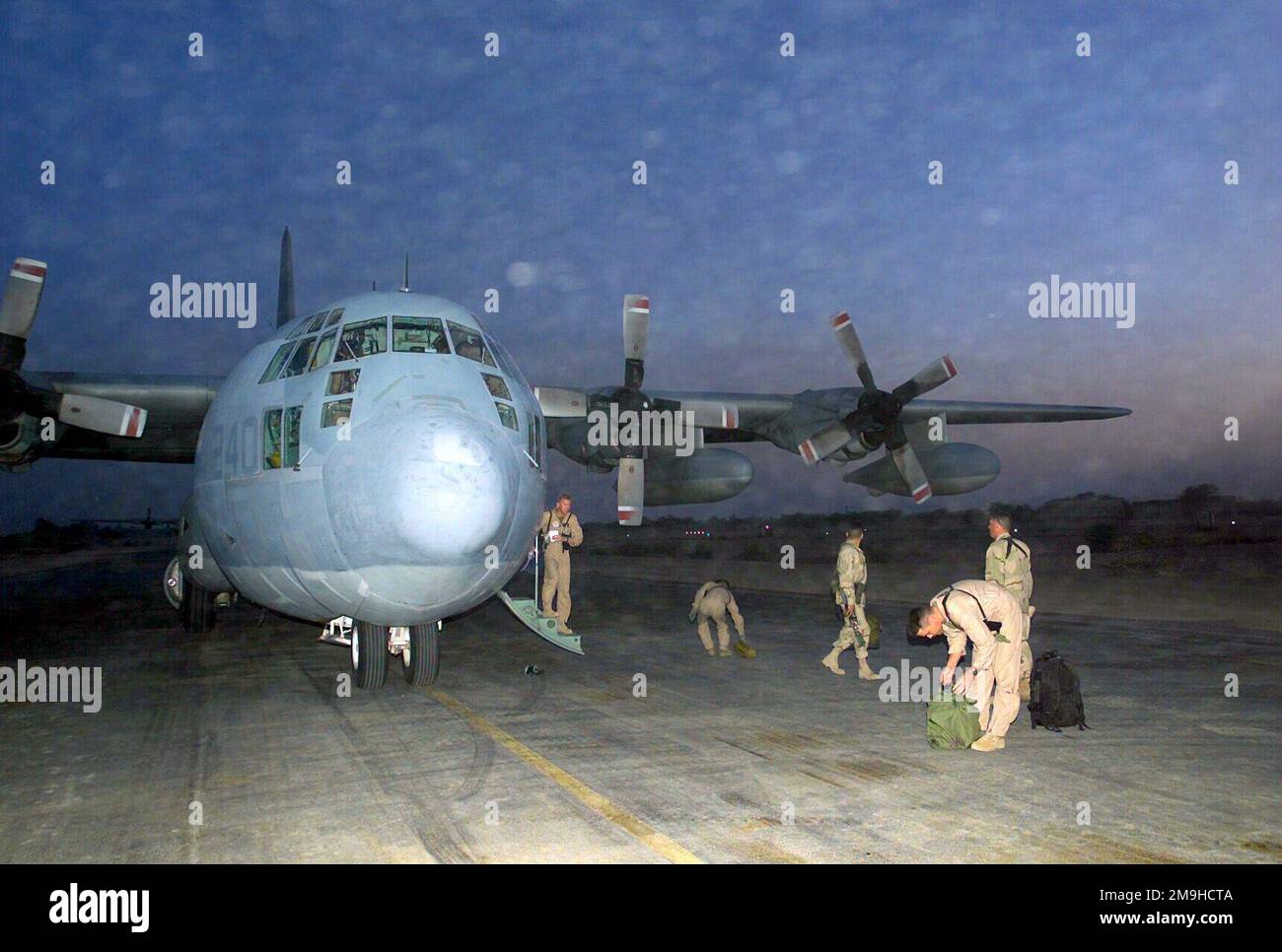 At dusk, Marines from Marine Aerial Refueler Transport Squadron-352 ...