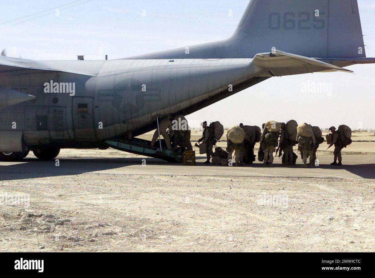 Located at a forward operating base Marines, with their MOLLE (Modular ...