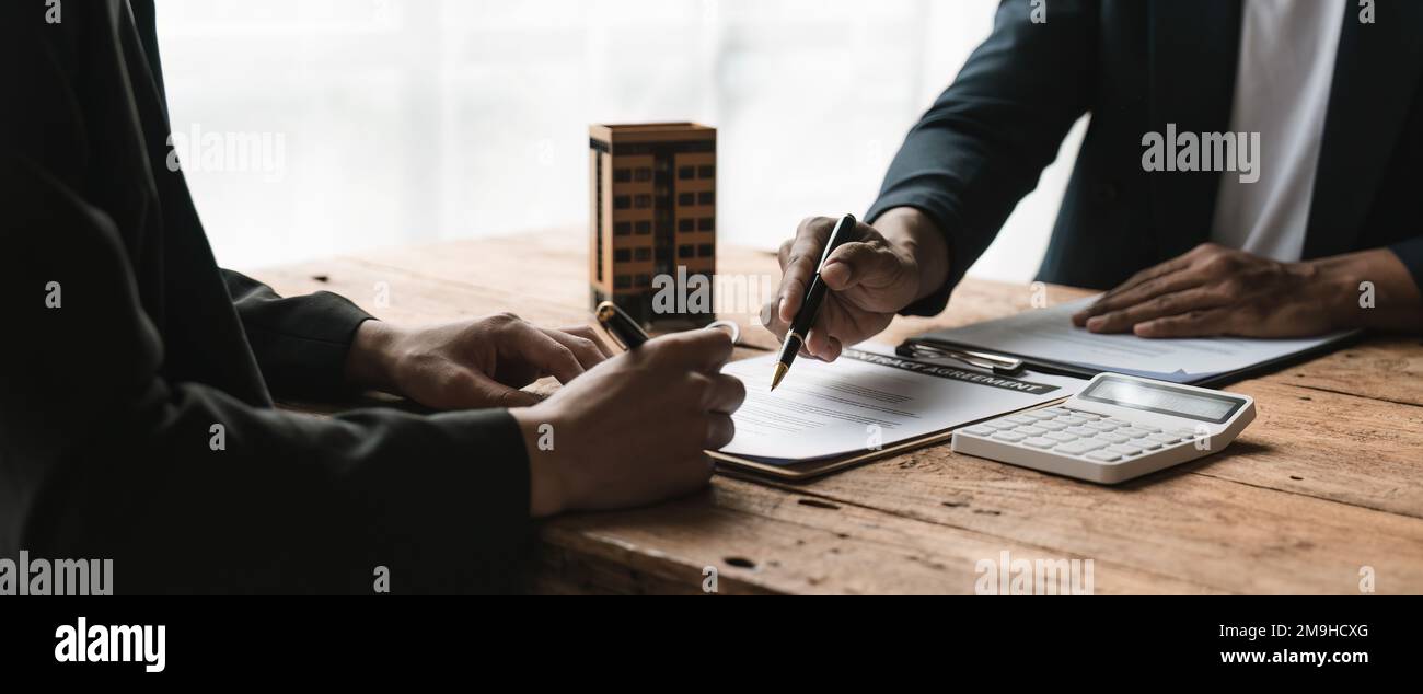 Real estate agent offer hand for customer sign agreement contract ...