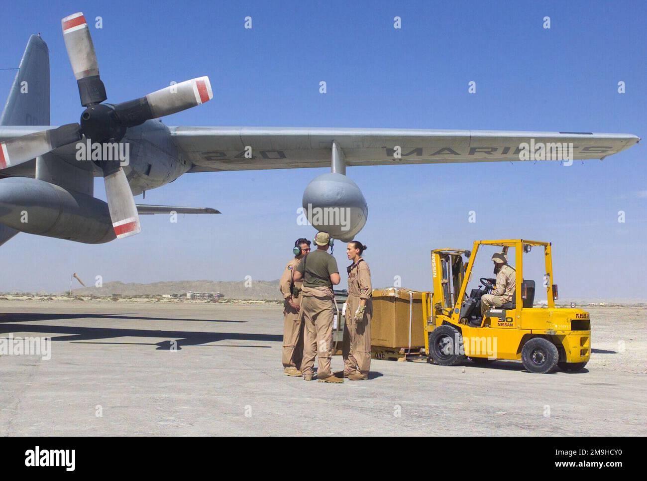 At a forward operating base, Marine Loadmasters Corporal Matthew Rider ...