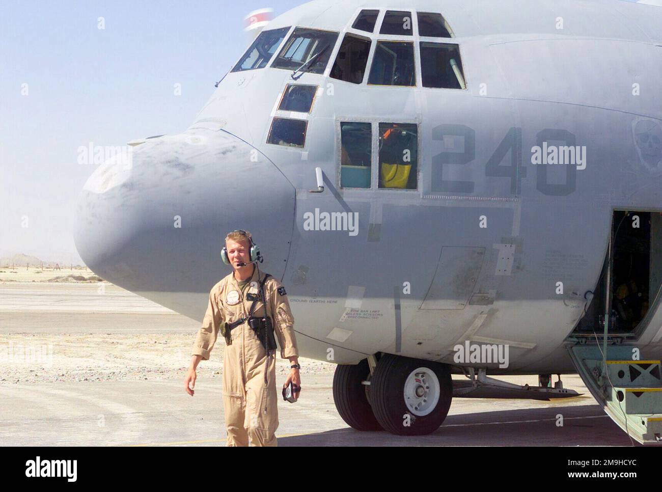 A Marine aircrew member from Marine Aerial Refueler Transport Squadron ...