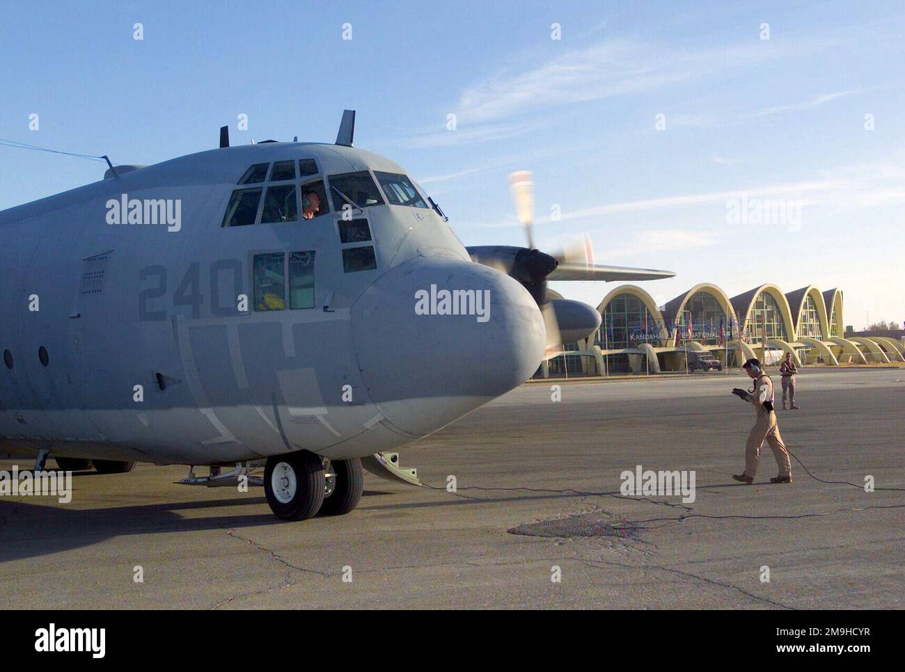 As the KC-130/R Hercules parks a Marine from Marine Aerial Refueler ...