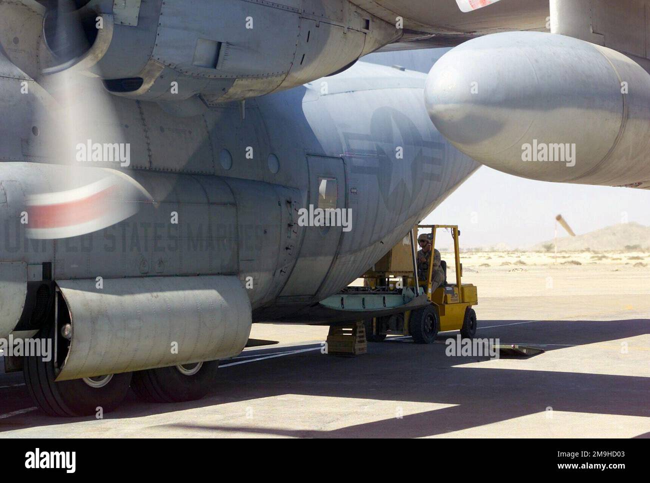 At a forward operating base, a forklift operator with the 26th Marine ...