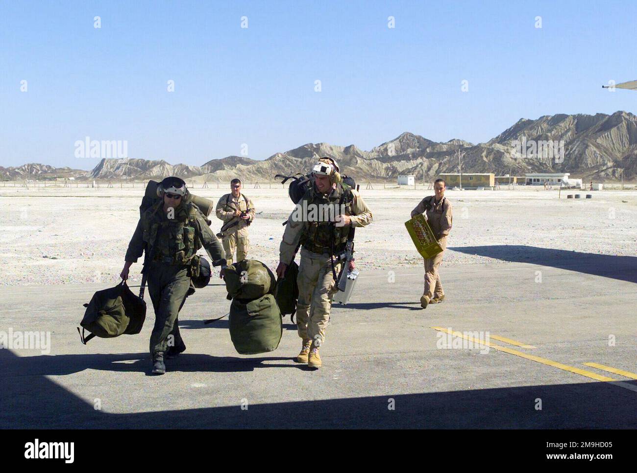 Located at a forward operating base Marines, with their MOLLE (Modular ...