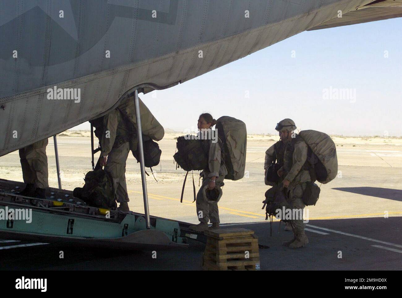 Located at a forward operating base Marines, with their MOLLE (Modular ...