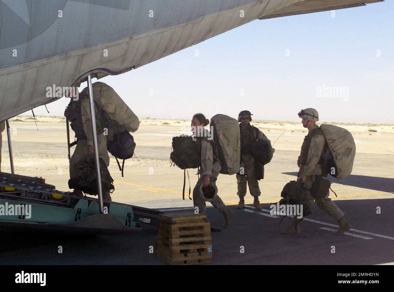 Located at a forward operating base Marines, with their MOLLE (Modular ...