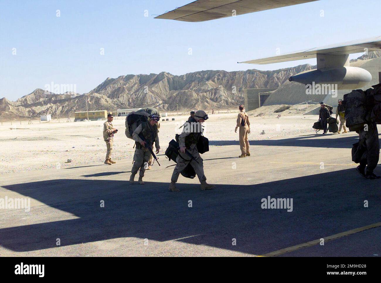 Located at a forward operating base Marines, with their MOLLE (Modular ...