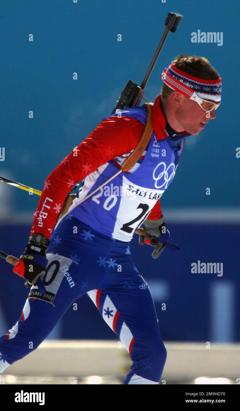 With his .22 caliber, bolt-action rifle slung on his back, World Class ...