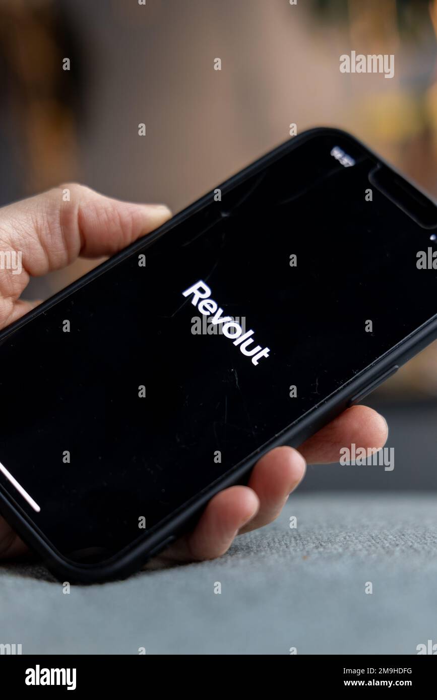 Amsterdam, Netherlands - 01.19.2021: Revolut app logo on iPhone screen ...