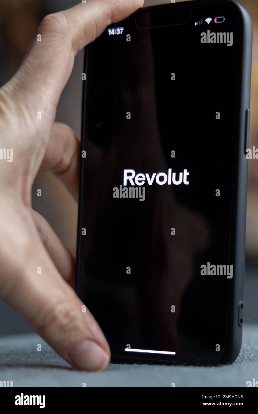 Amsterdam, Netherlands - 01.19.2021: Revolut app logo on iPhone screen ...