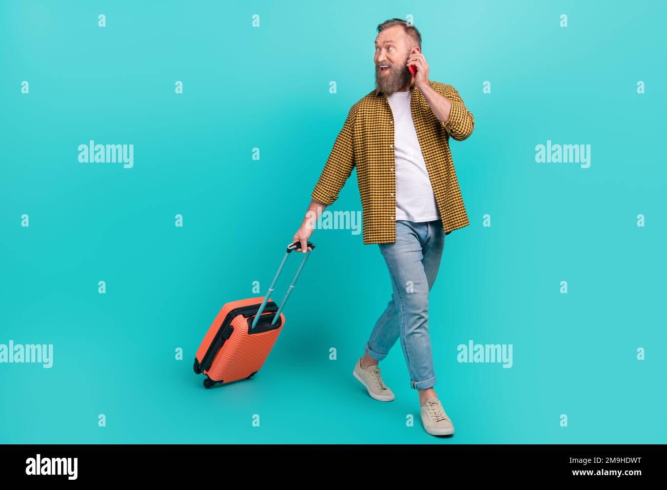 Photo of attractive senior businessman walk look empty space reserving ...