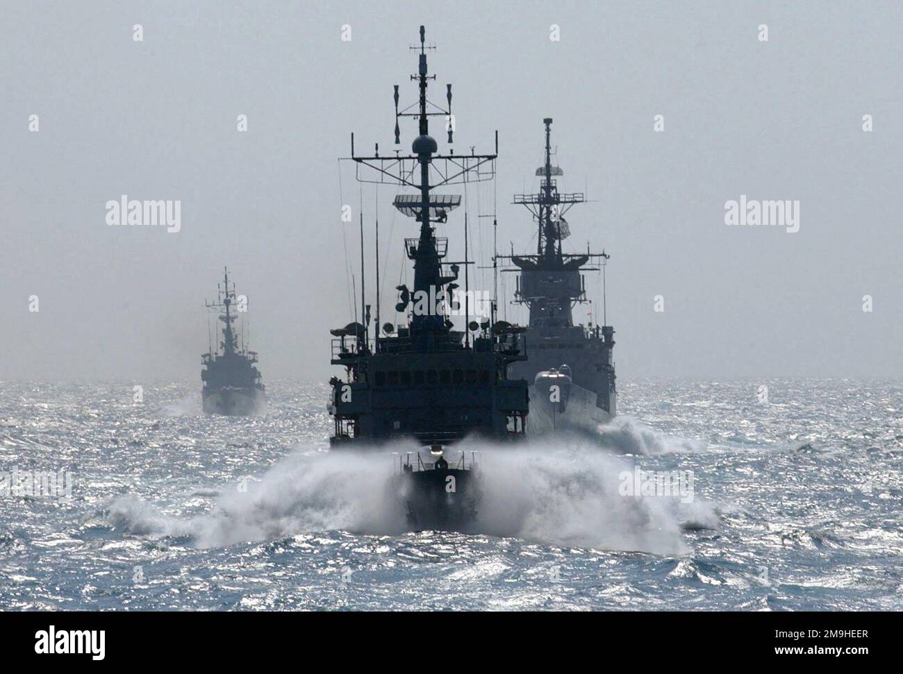 020226-N-0872M-505. [Complete] Scene Caption: An armada of naval sea ...