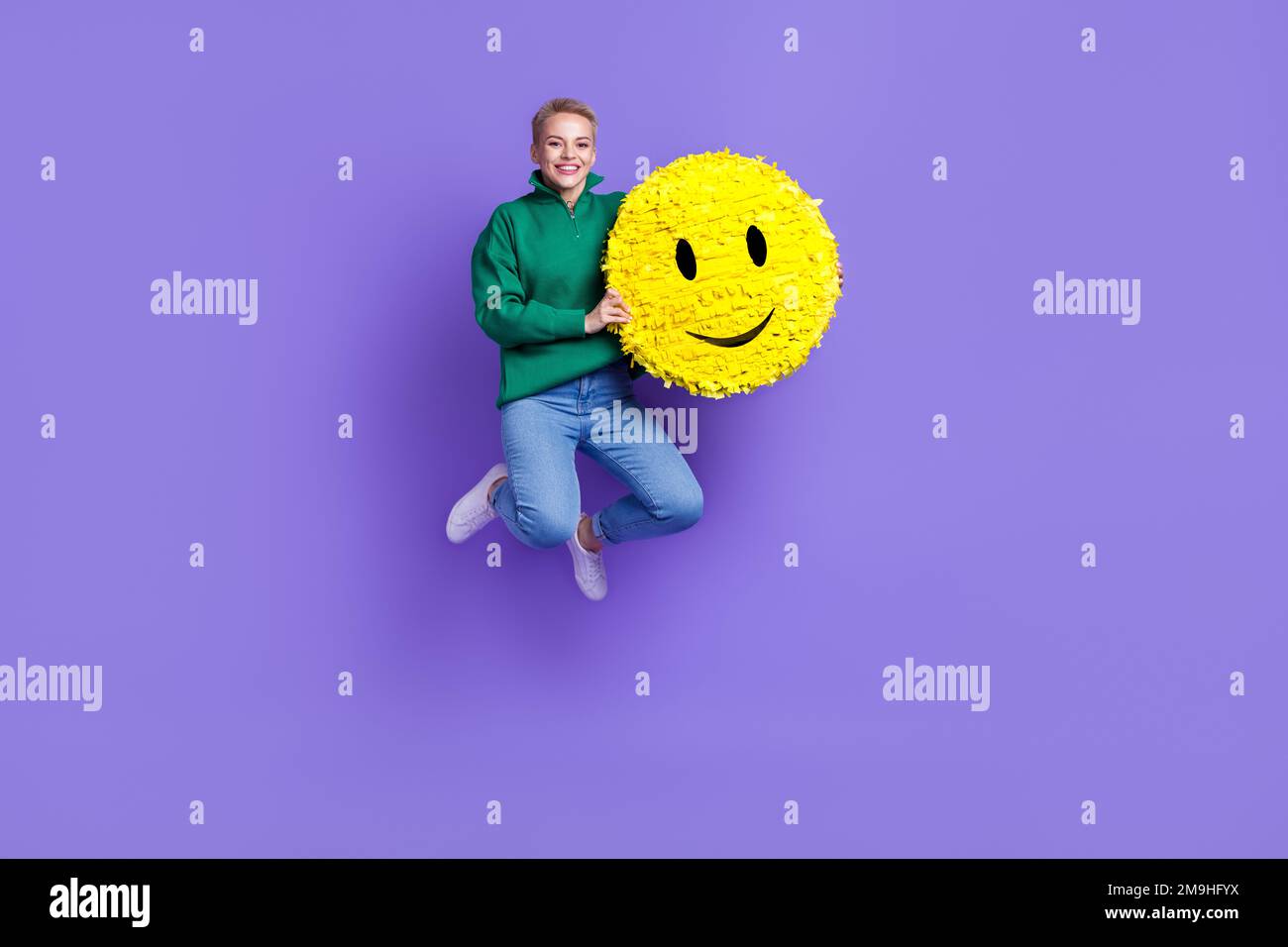 Full length photo of positive cheerful lady wear green sweater jumping ...