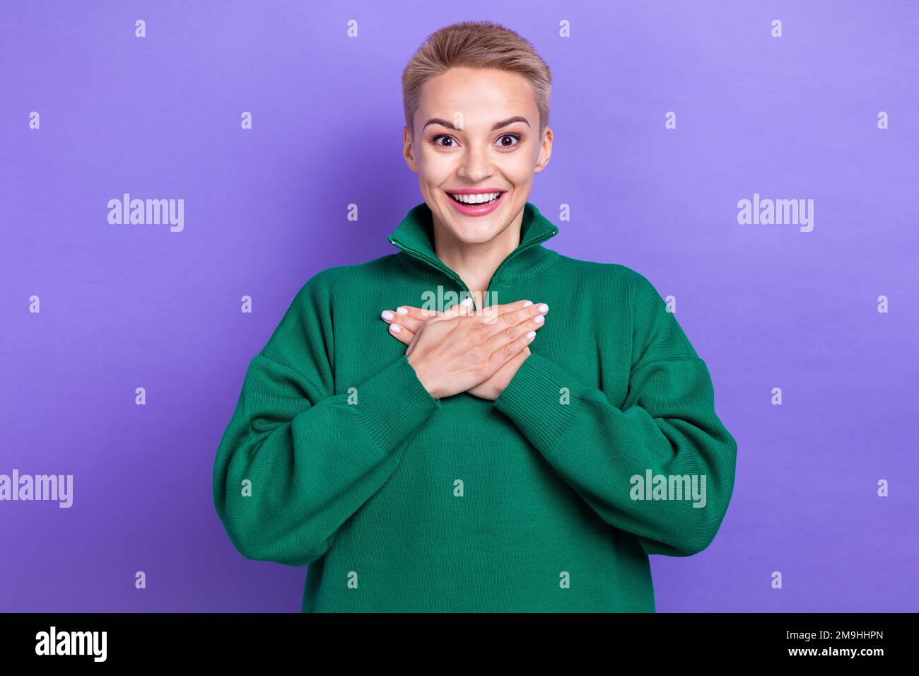 Portrait of astonished cheerful girl arms touch chest beaming smile ...