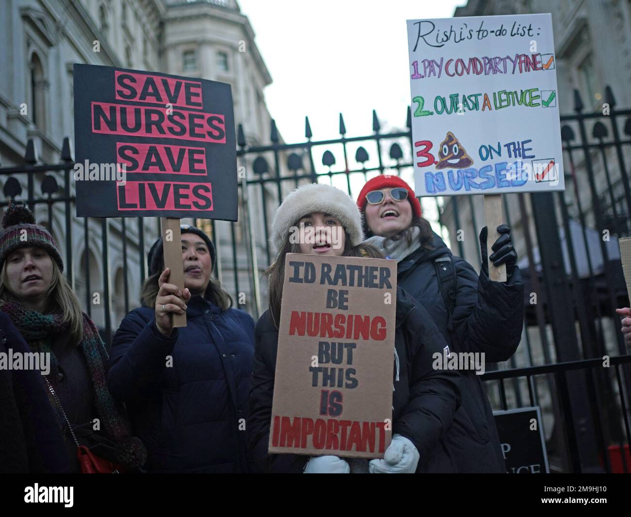 Protesters outside Downing Street, London, during the nurses strike ...